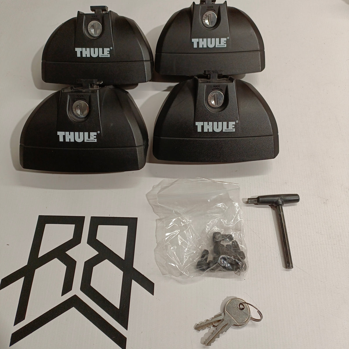 Thule 753 footpack (Flush Rail & Fixed Points) – Roof Boxed